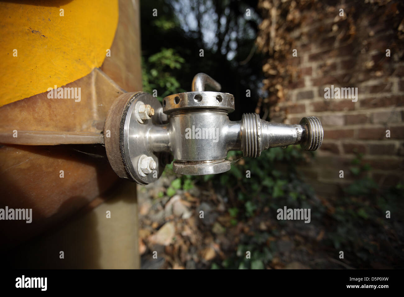 Storage vat tap. All phases of cider production in the south west UK ...