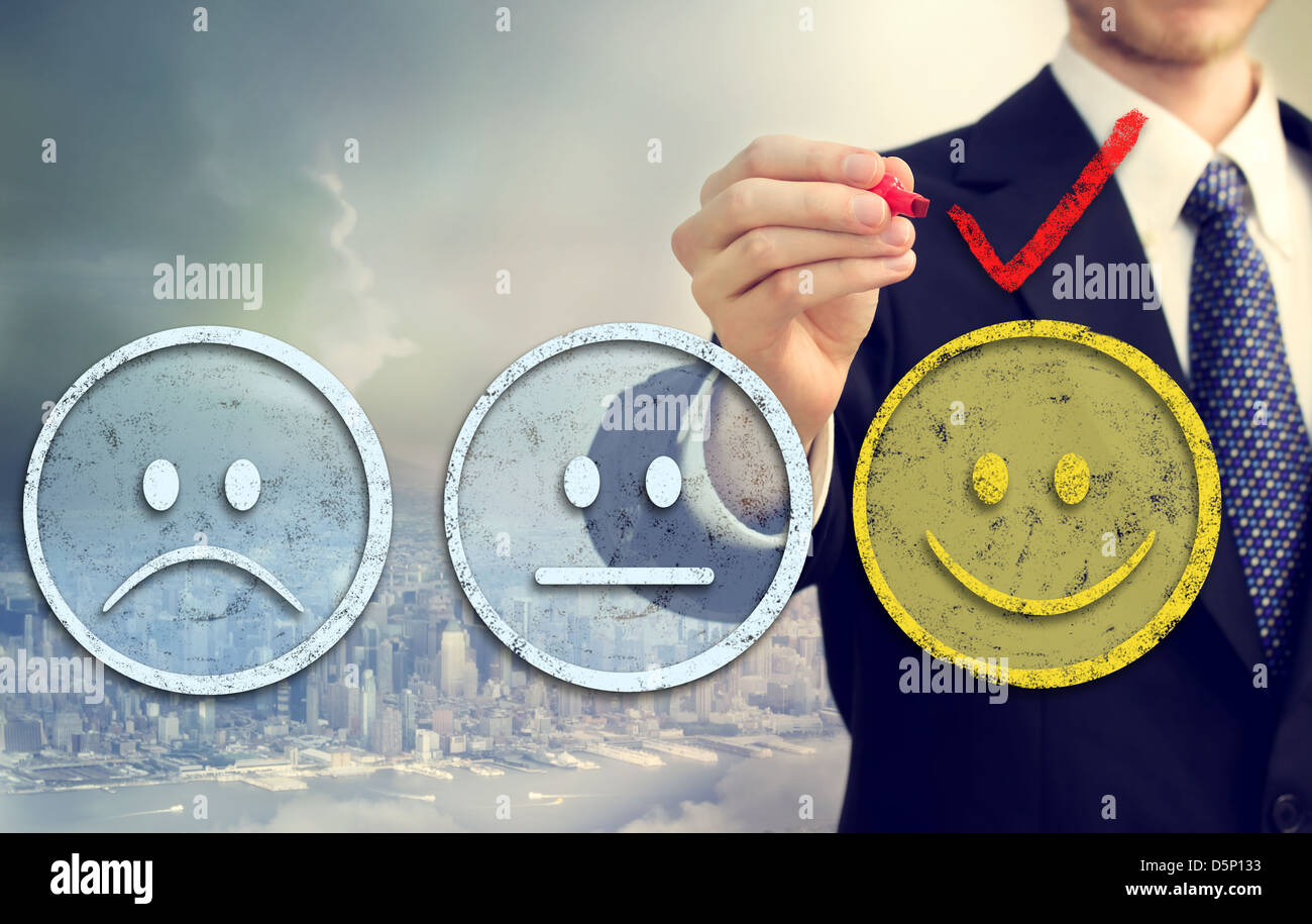 Business man drawing a check on smiley face Stock Photo - Alamy