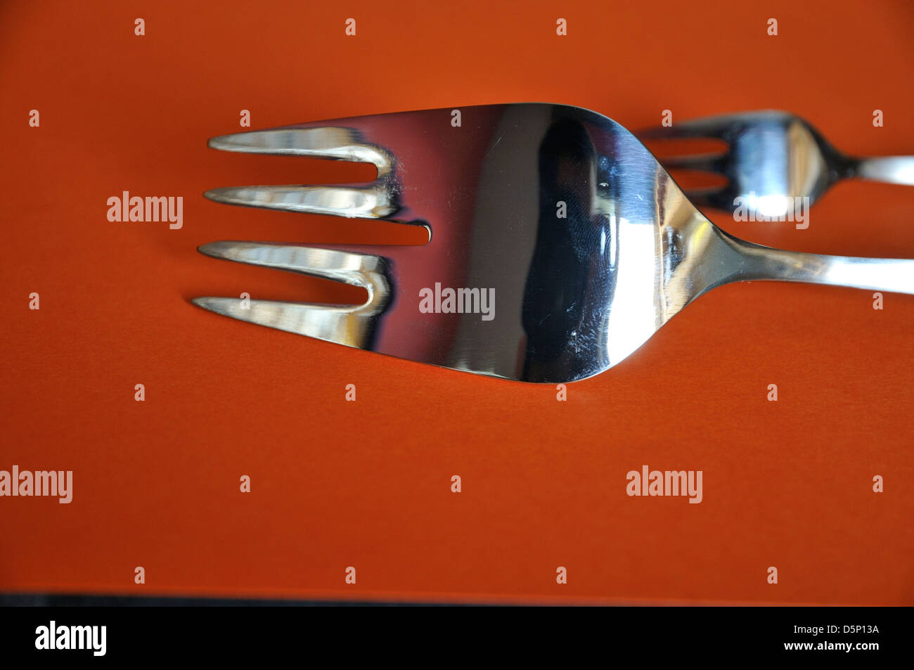 small and large fork Stock Photo - Alamy