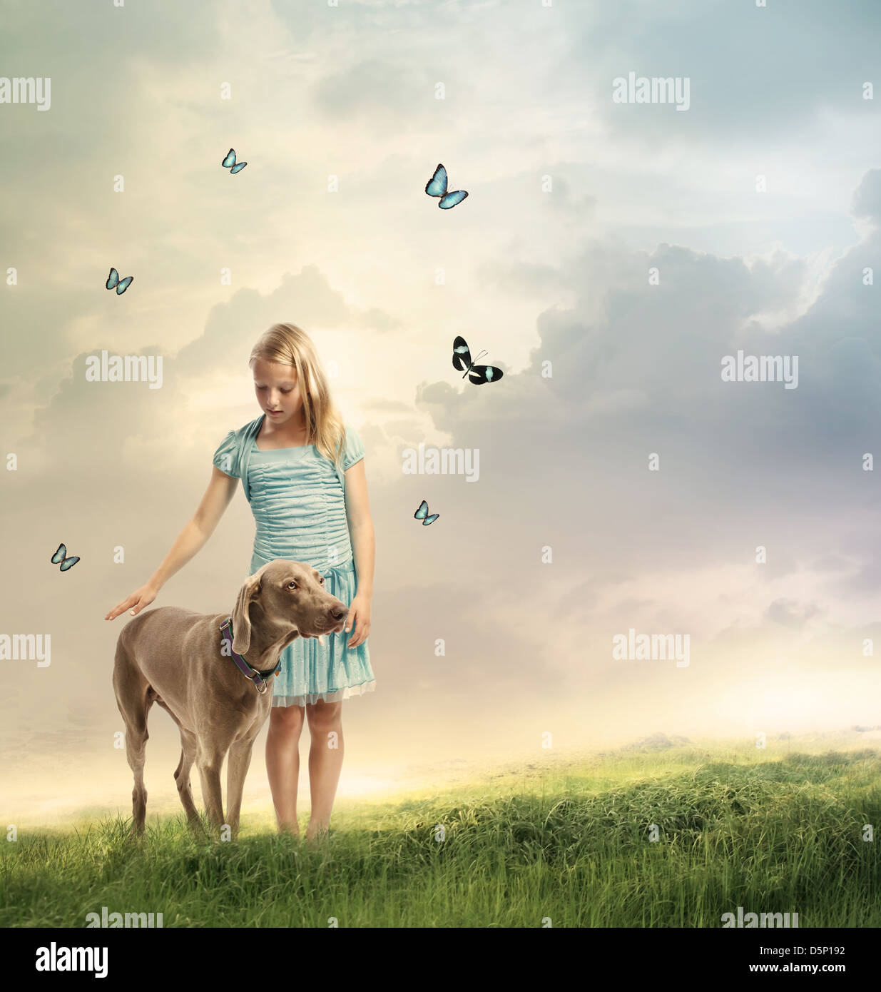Young Blonde Girl with her Dog on a Magical Mountain Stock Photo - Alamy
