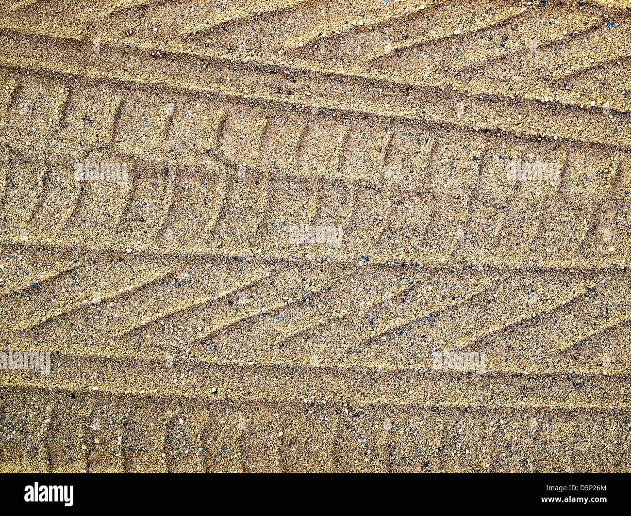 Wheel tracks in the sand. Textured background Stock Photo - Alamy