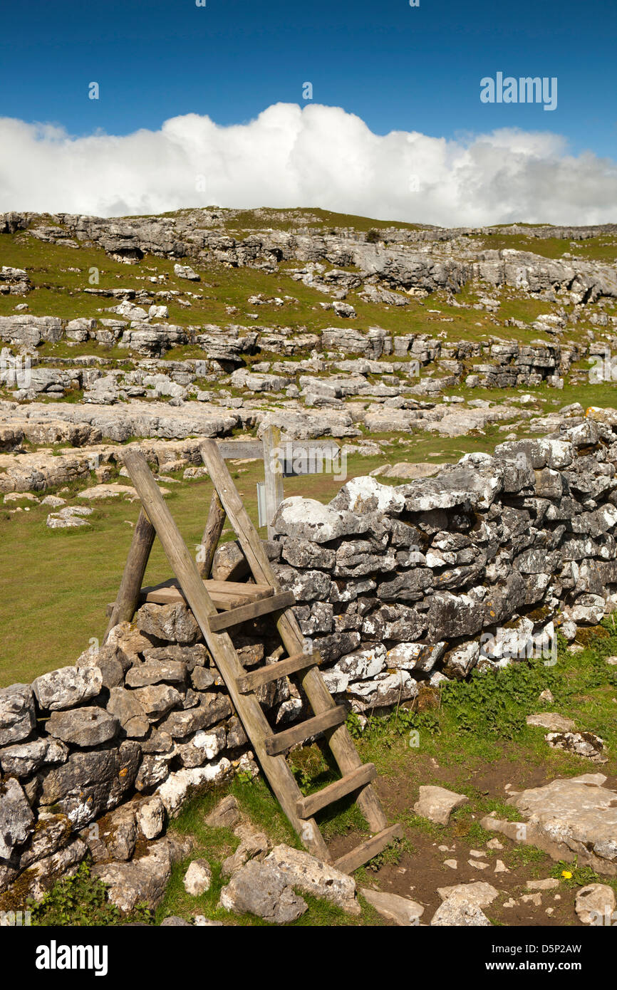 UK, England, Yorkshire, Malham Cove, stile on the Pennine Way Stock ...