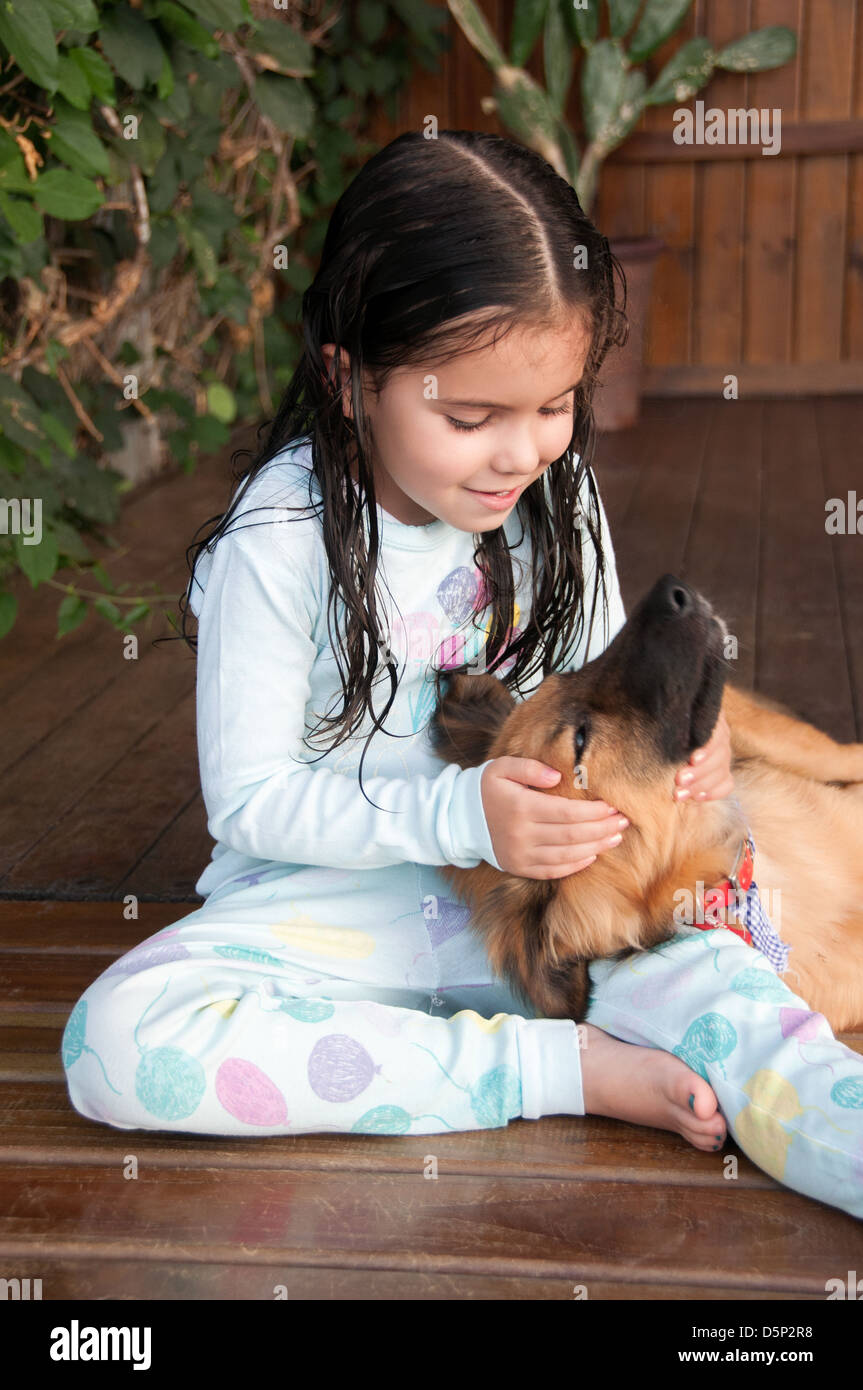 Girl and her dog Stock Photo - Alamy