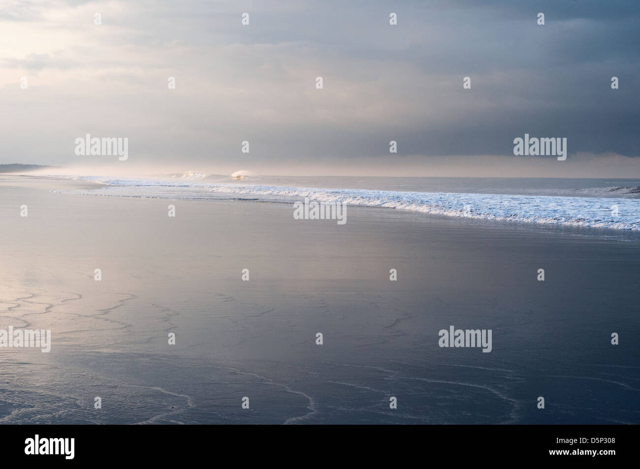 Early morning on a beach Stock Photo - Alamy