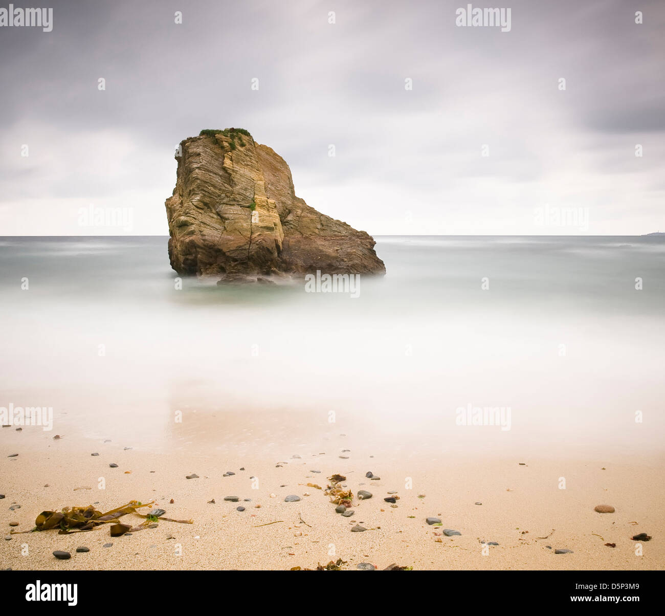 Rock and beach Stock Photo - Alamy
