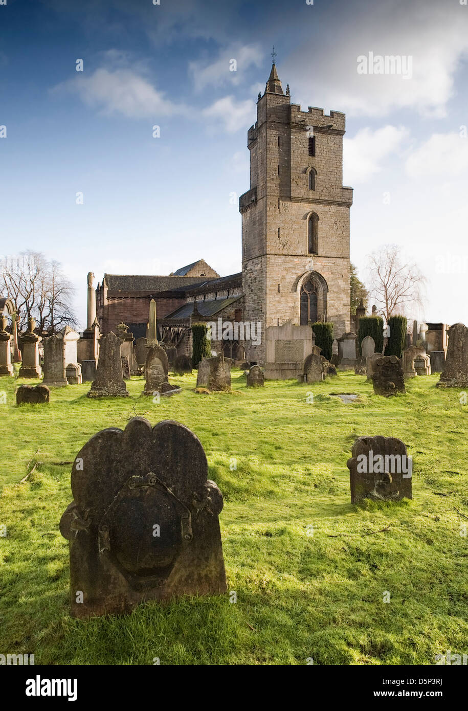 Scottish cemetery with tombstones and church Stock Photo - Alamy