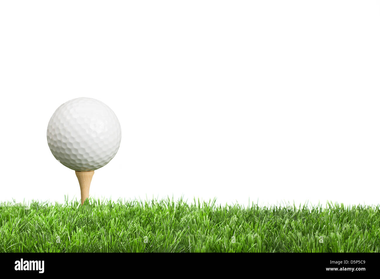 Golf ball on tee with white background for copy space Stock Photo - Alamy