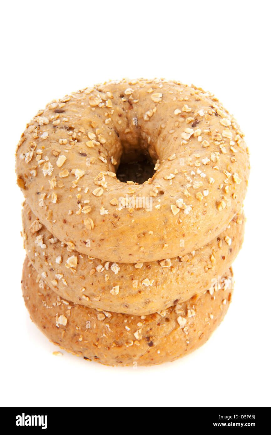 Stacked bagelsl isolated over white background Stock Photo - Alamy