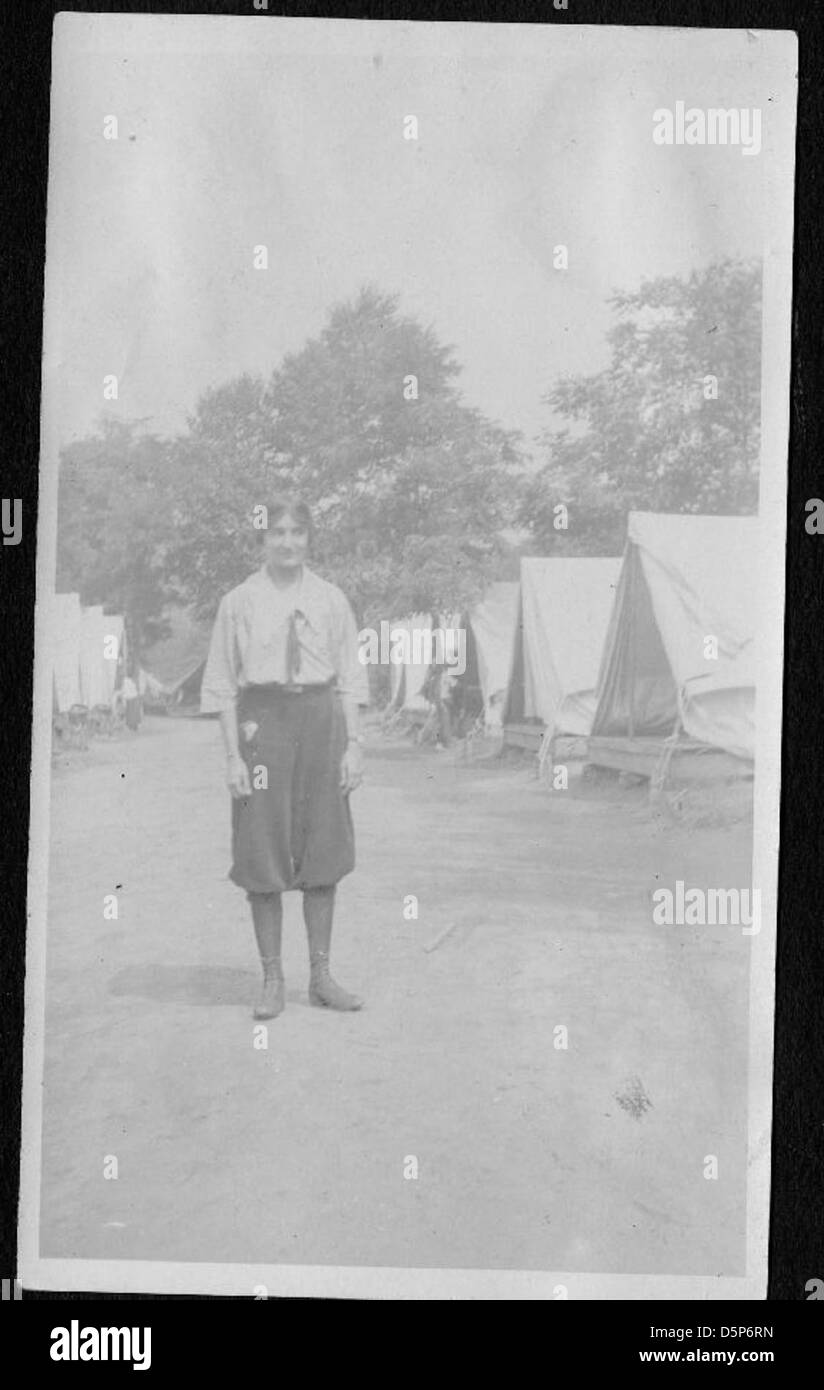 Helen Richey, a pioneering female aviator, is shown standing outdoors ...