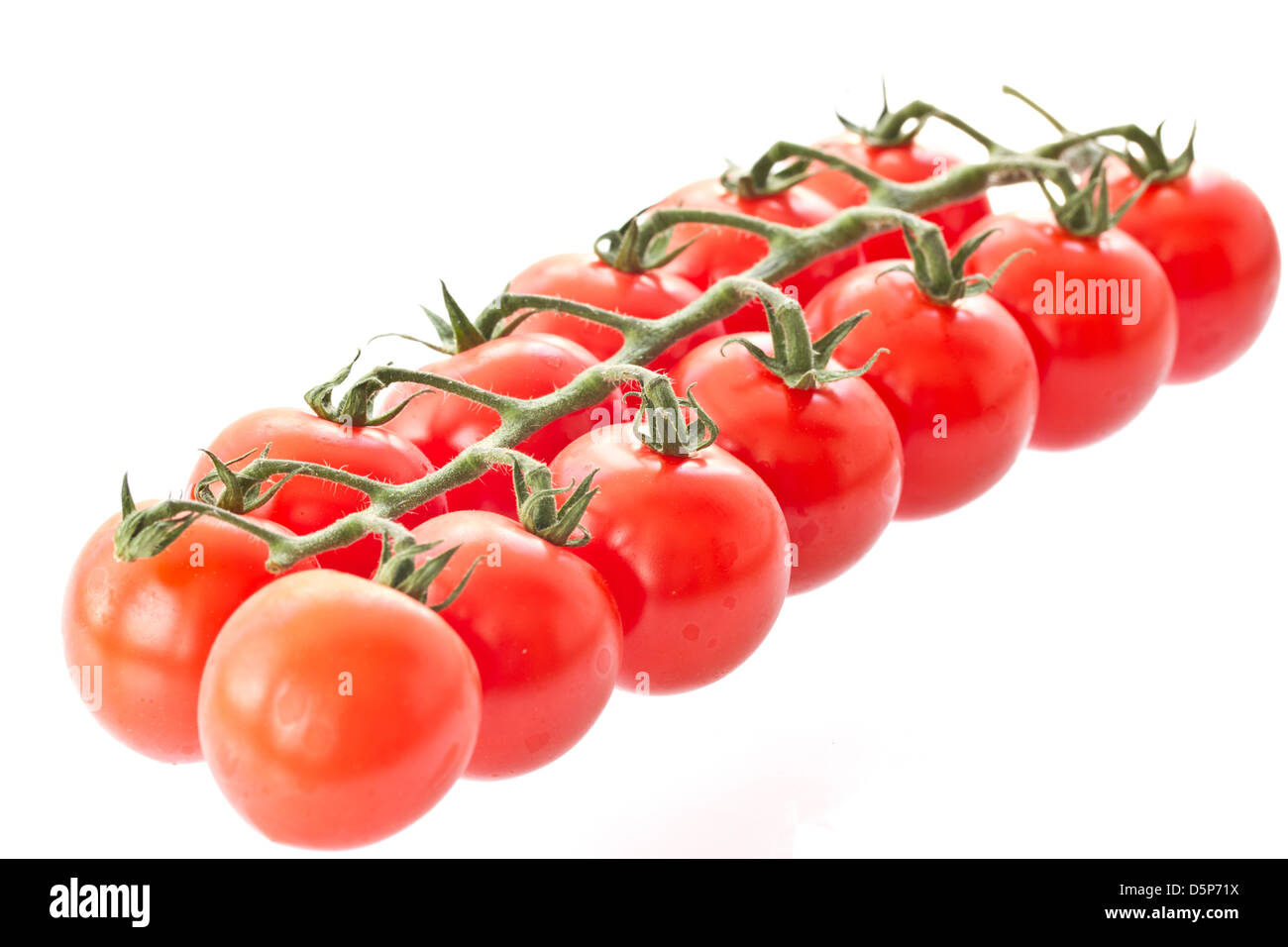 ripe red tomatoes isolated on white background Stock Photo - Alamy