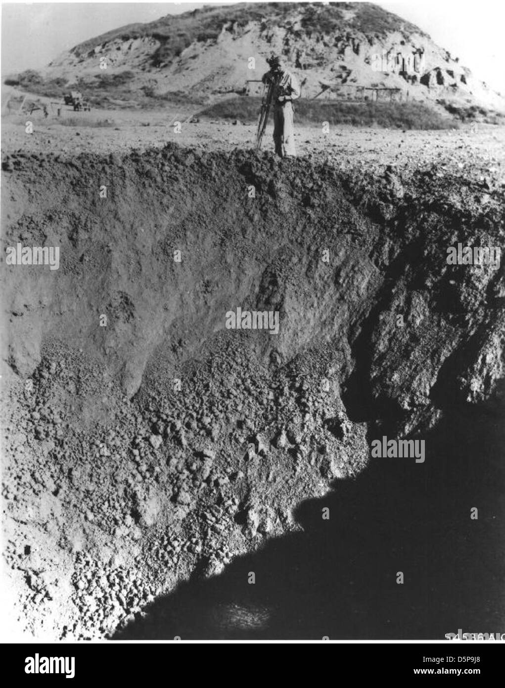 A 1000 lb bomb crater in Kweilin, China, created during World War II ...