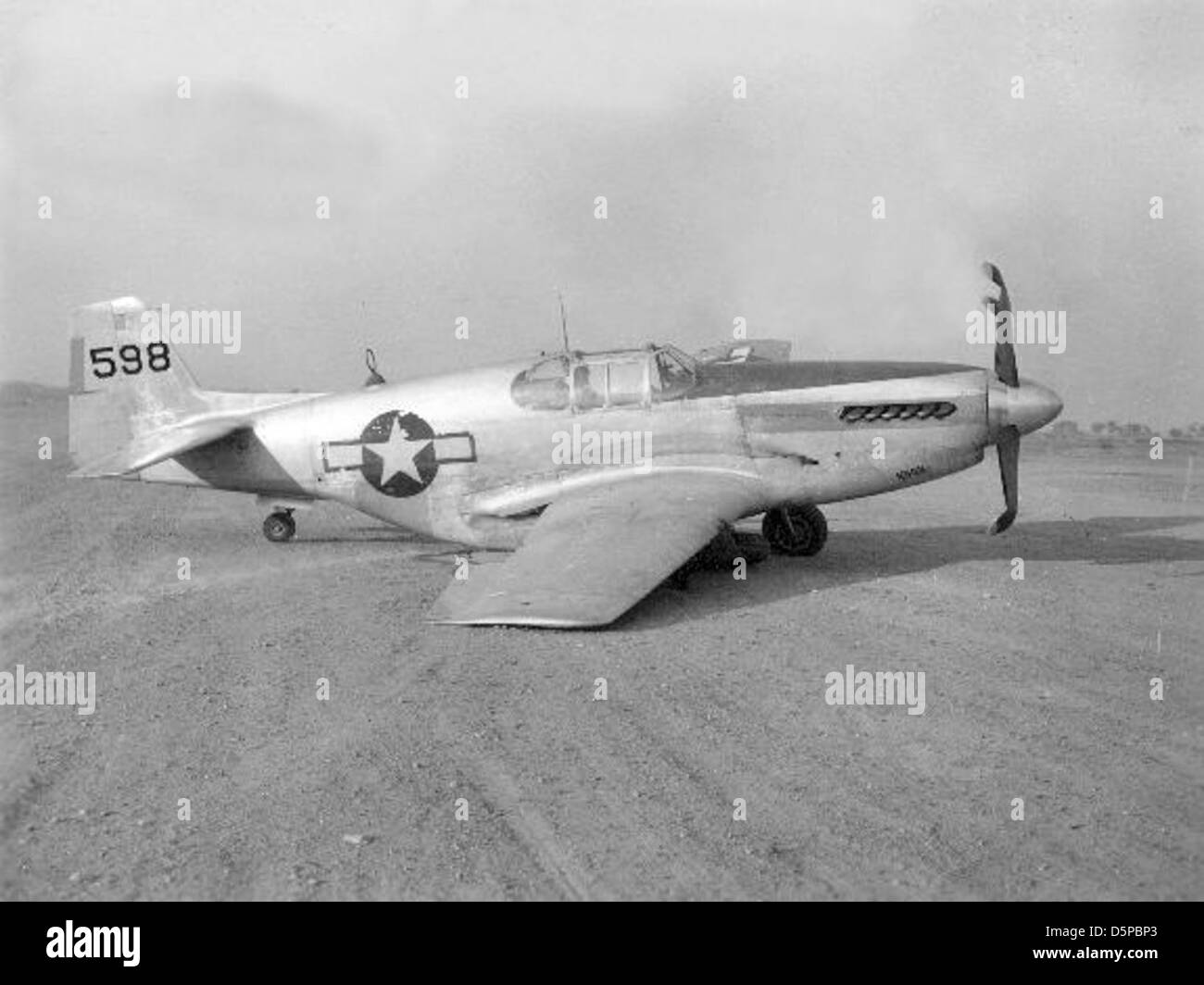 The image features Lt. Crowell and a collapsed landing gear on an ...
