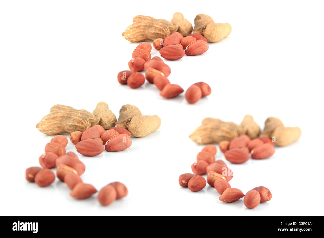 A lot of Peanuts (Three action Peanuts) on isolated over white ...