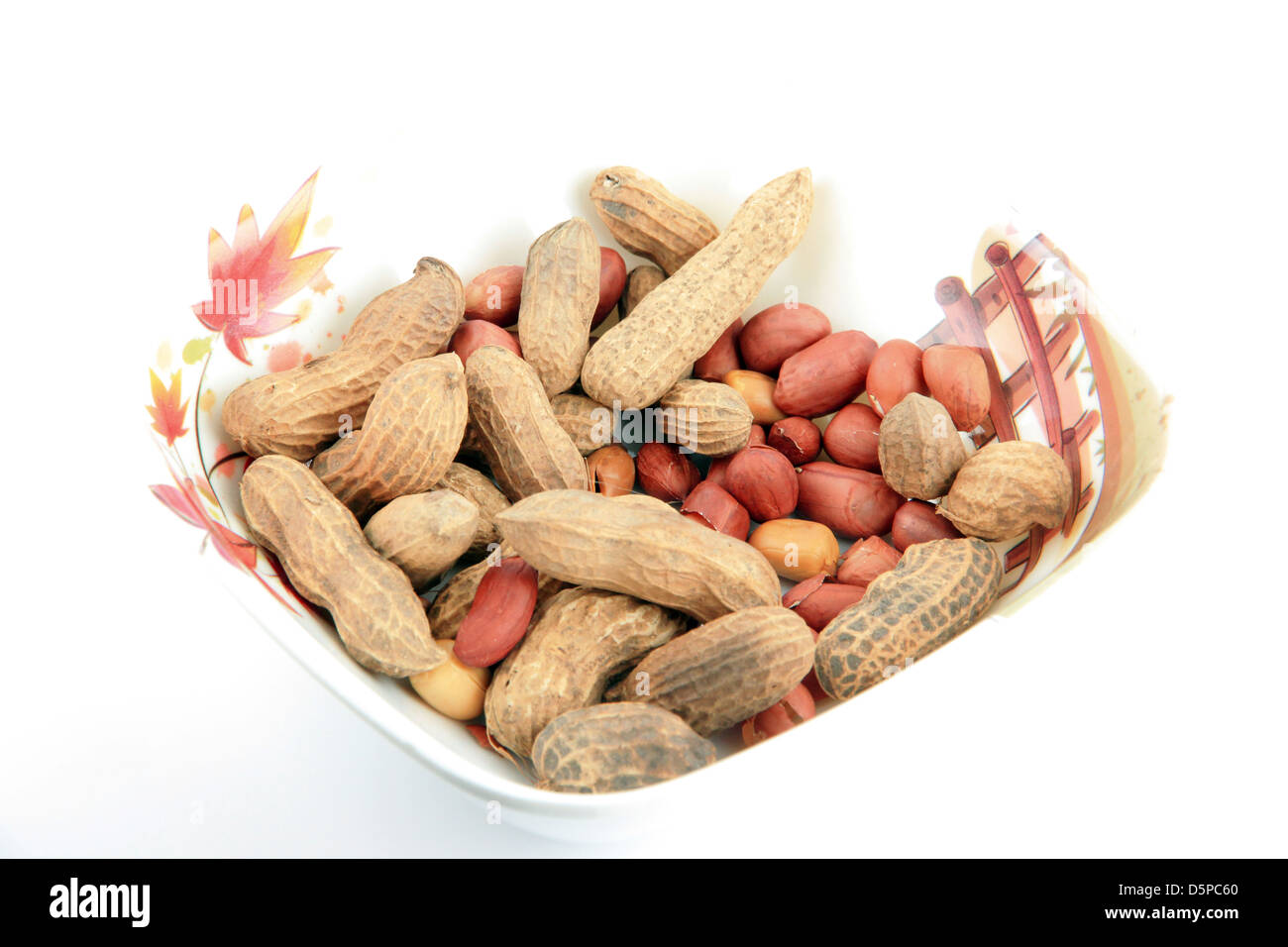 A lot of Peanuts on isolated over white background Stock Photo - Alamy