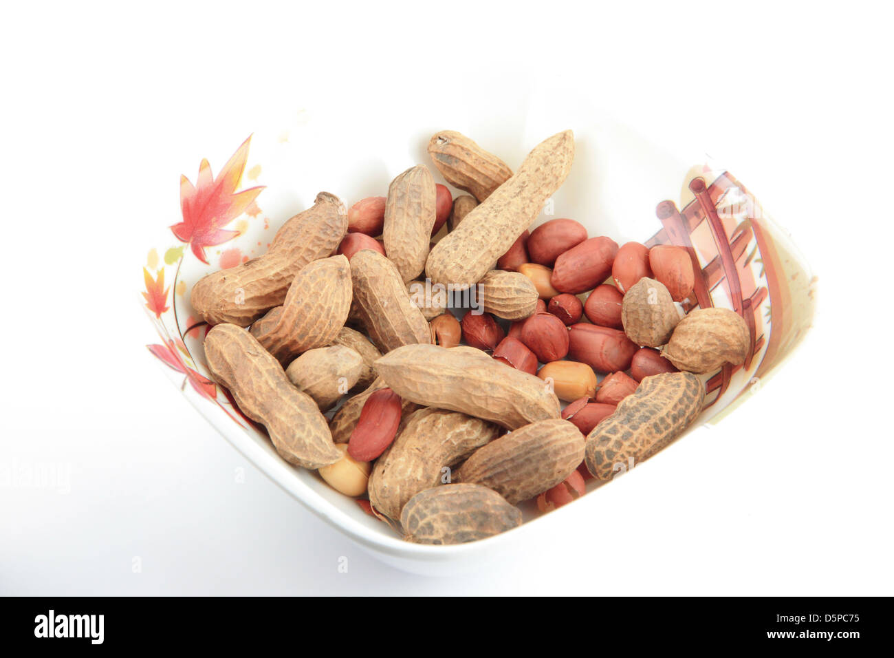 A lot of Peanuts on isolated over white background Stock Photo - Alamy