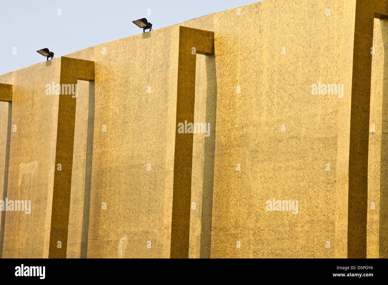 Building walls are made of wood. Design Patterns with golden Stock ...