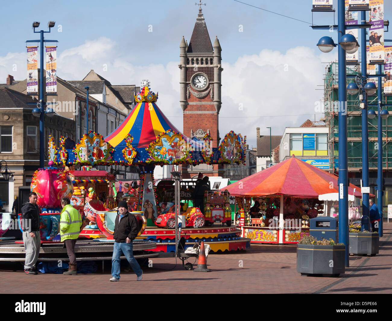 Fairground attractions set up in Redcar High Street for the school ...