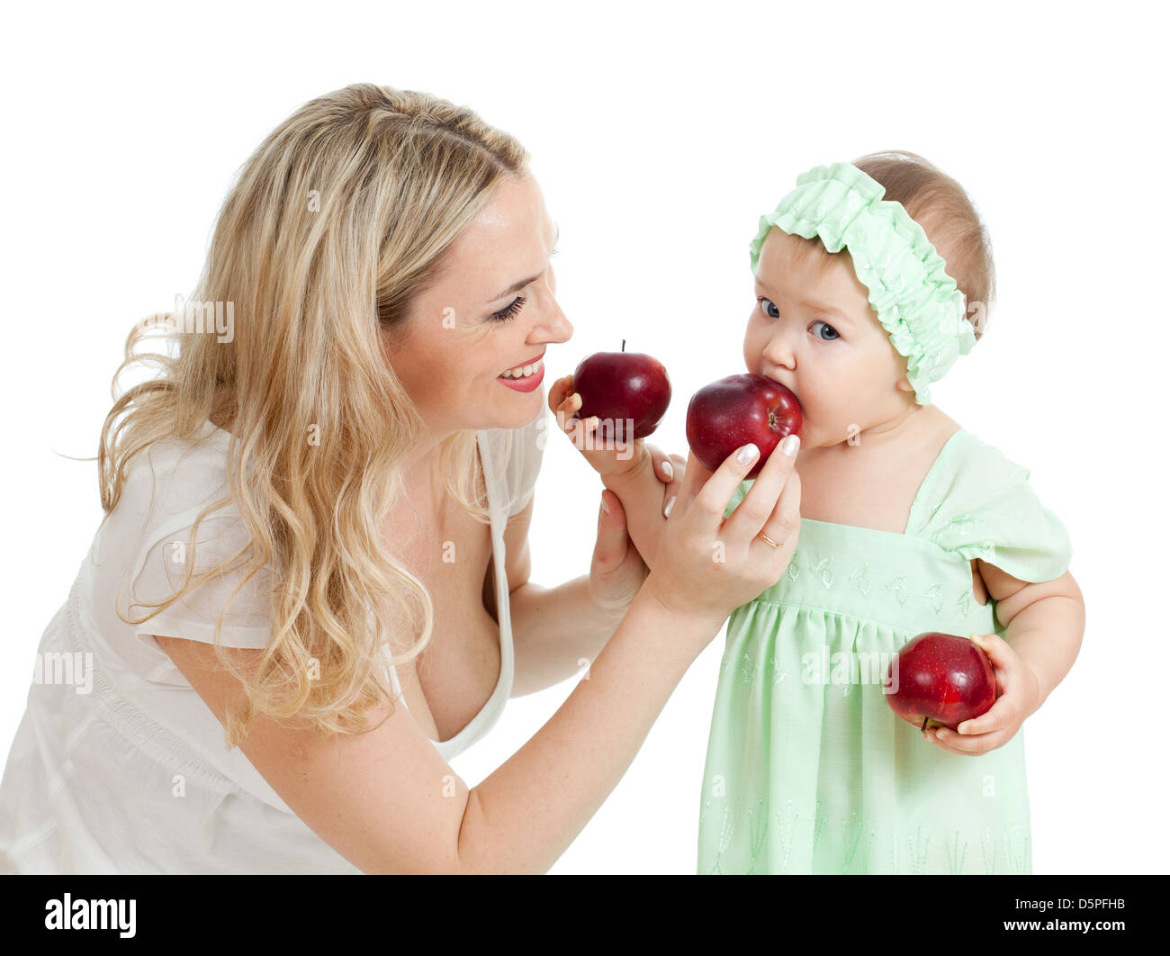 mother and her child with red apples Stock Photo - Alamy