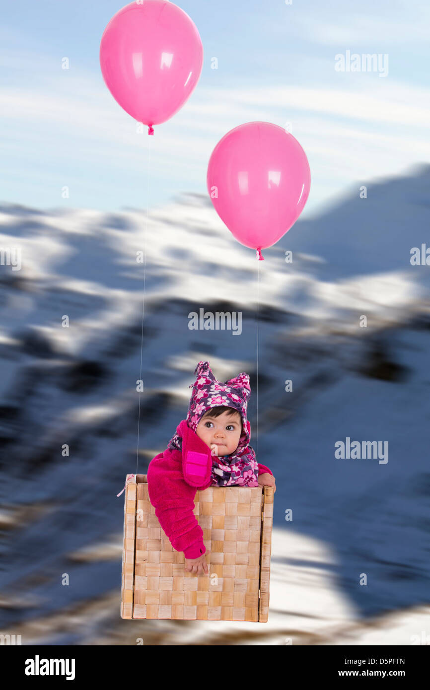 Baby in the air Stock Photo - Alamy
