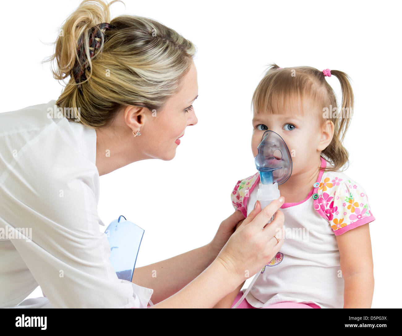 Doctor holding inhaler mask for kid breathing, hospital Stock Photo - Alamy