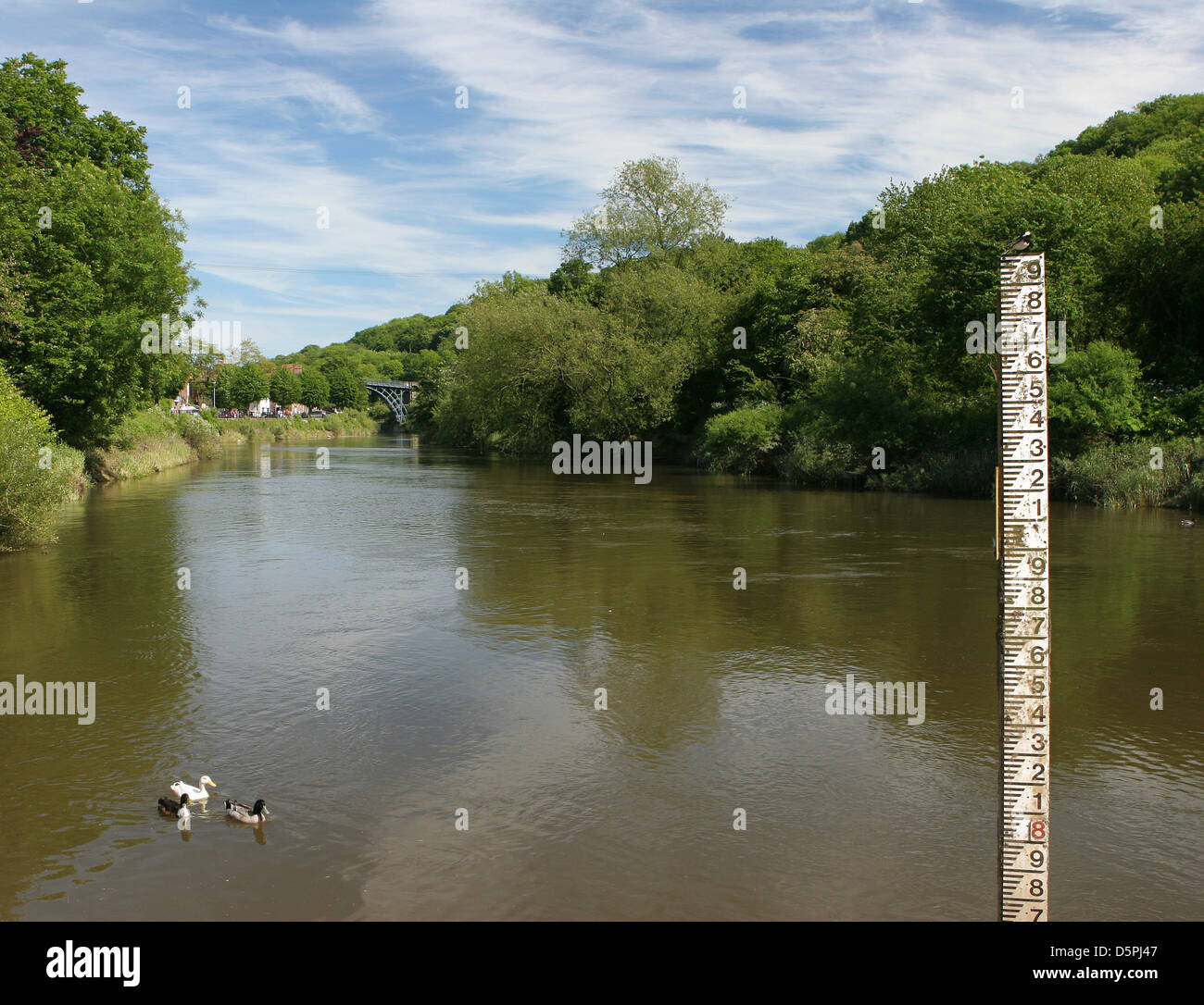 River Severn at Ironbridge with flood level indicator Stock Photo - Alamy