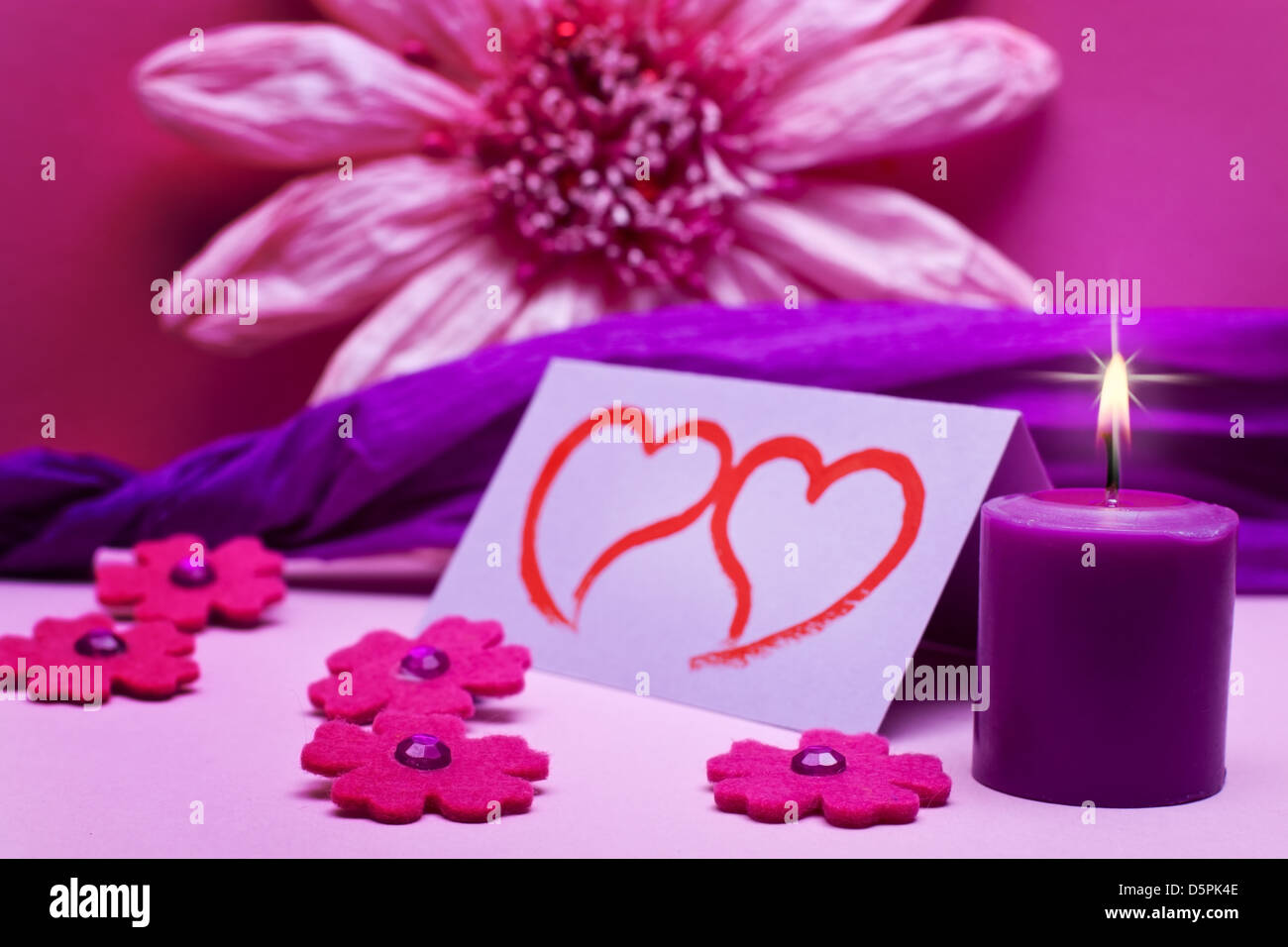 romantic purple background with candle Stock Photo - Alamy
