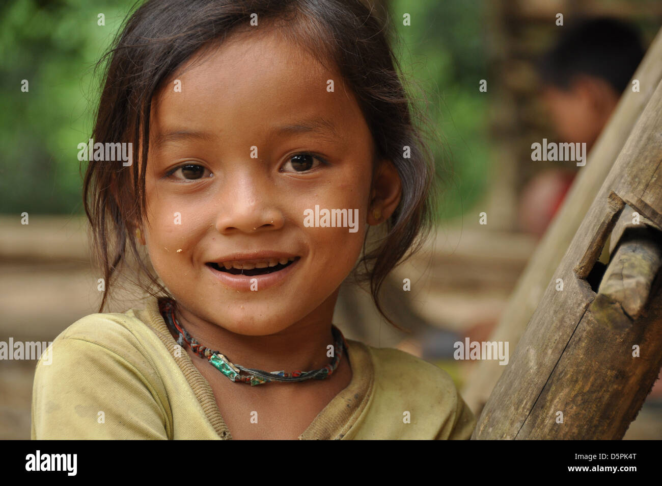 Portrait of a young girl in Laos Stock Photo - Alamy