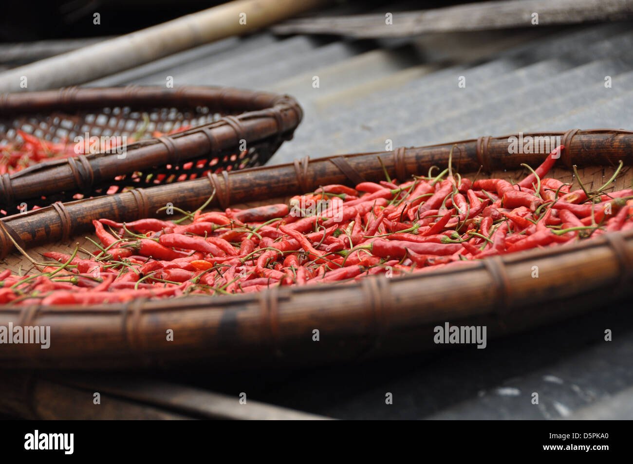 Hot chilli peppers for sale at a market in Laos Stock Photo - Alamy