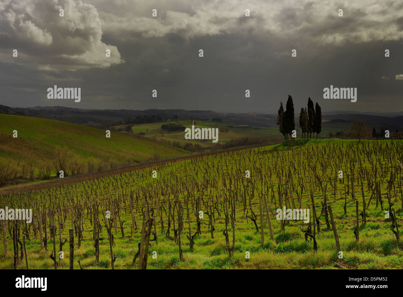A dramatic dark sky over tuscan hills Stock Photo - Alamy