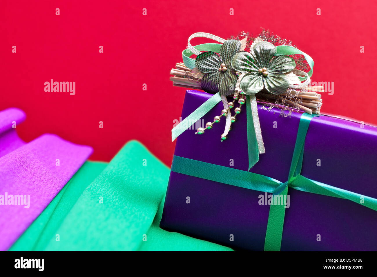 present in front of colorful background Stock Photo - Alamy