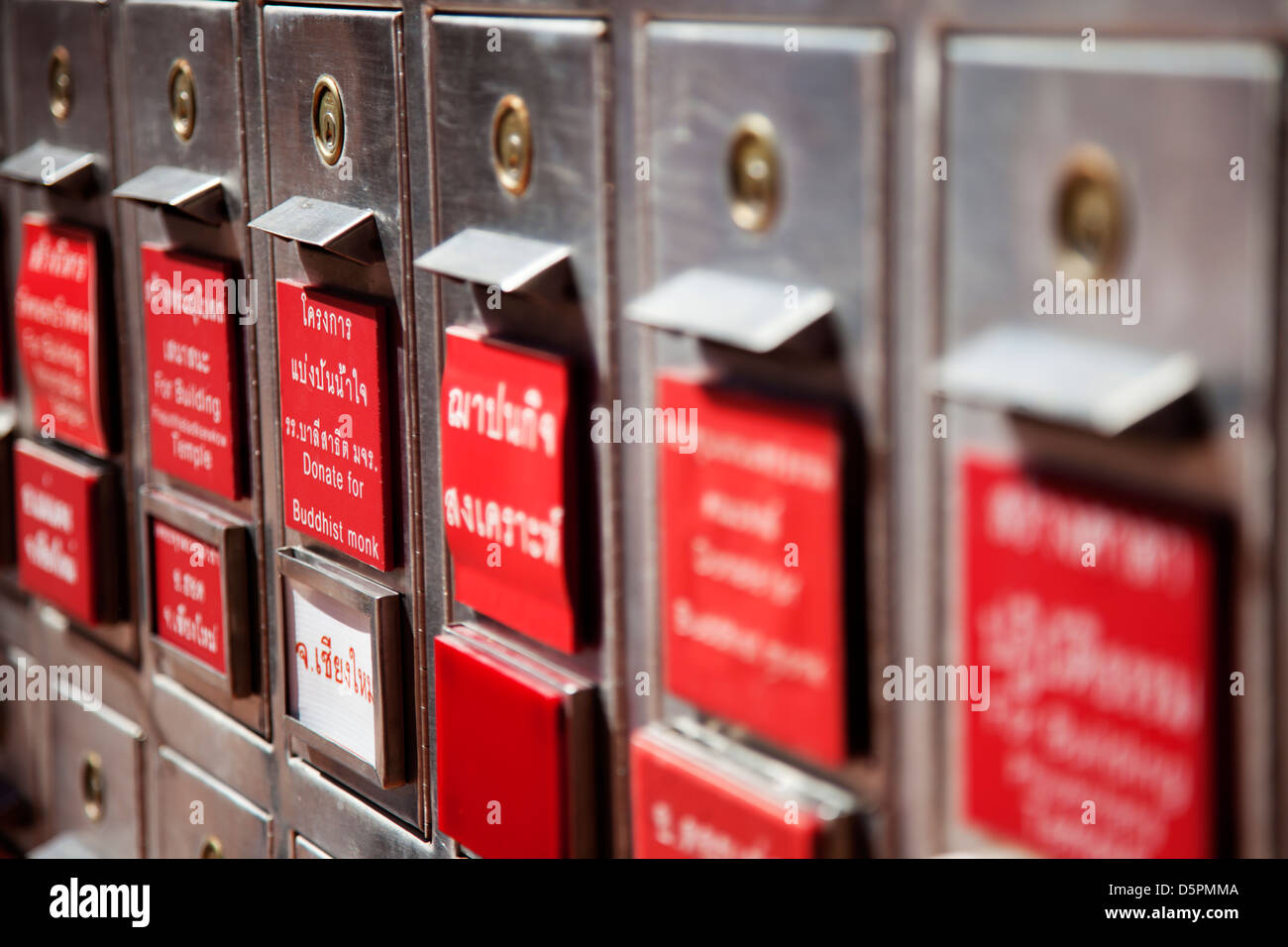 Donation boxes in temple Stock Photo - Alamy