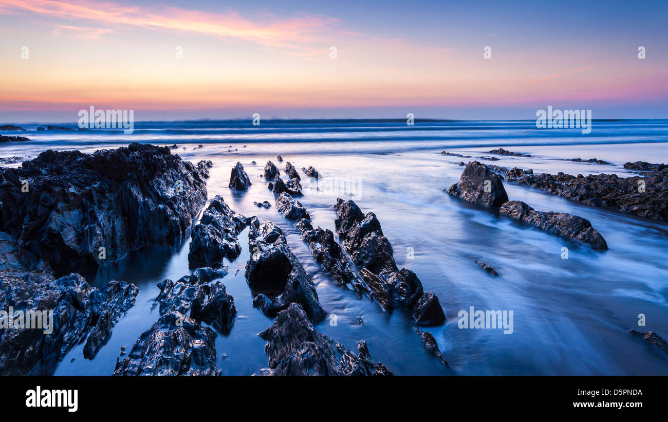 Waves on the Rocks at Croyde Beach on the North Devon Coast England UK ...