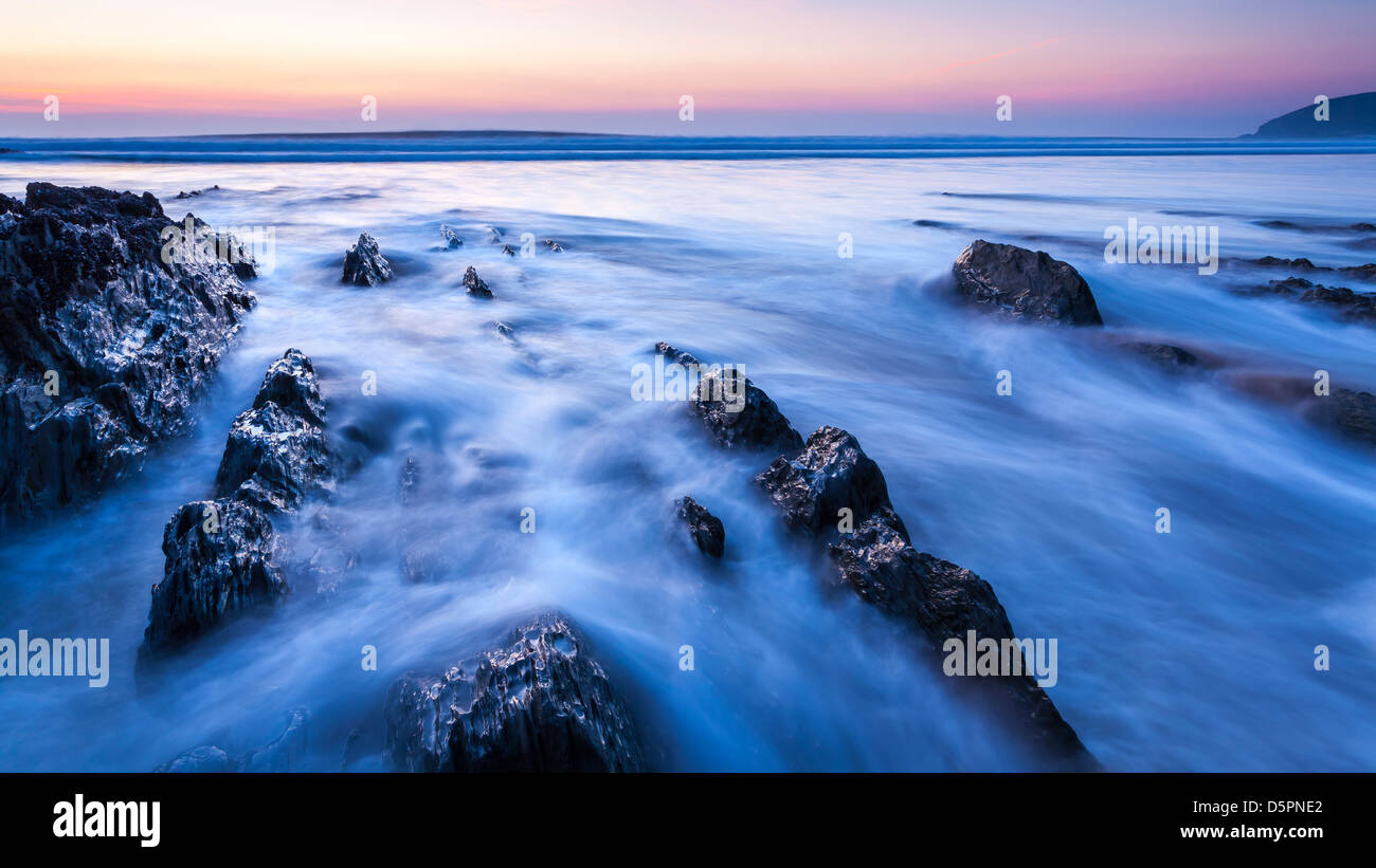 Waves on the Rocks at Croyde Beach on the North Devon Coast England UK ...