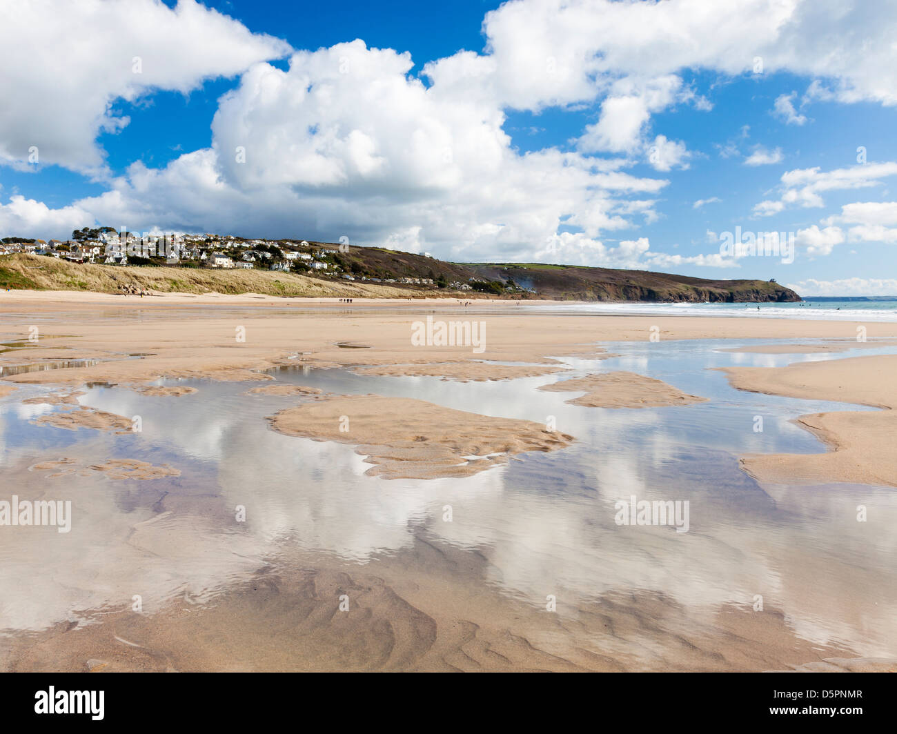 Reflections of sky in pools of water on beach hi-res stock photography ...