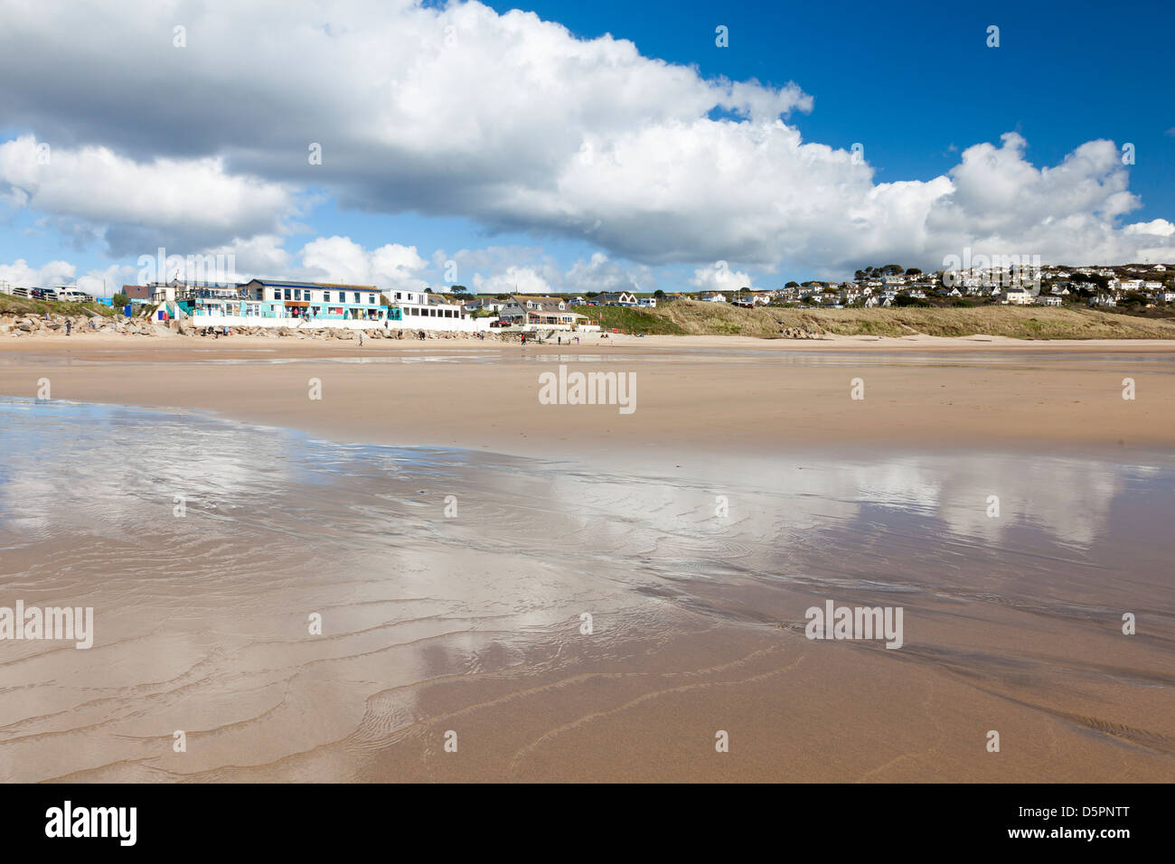 Reflections of sky in pools of water on beach hi-res stock photography ...
