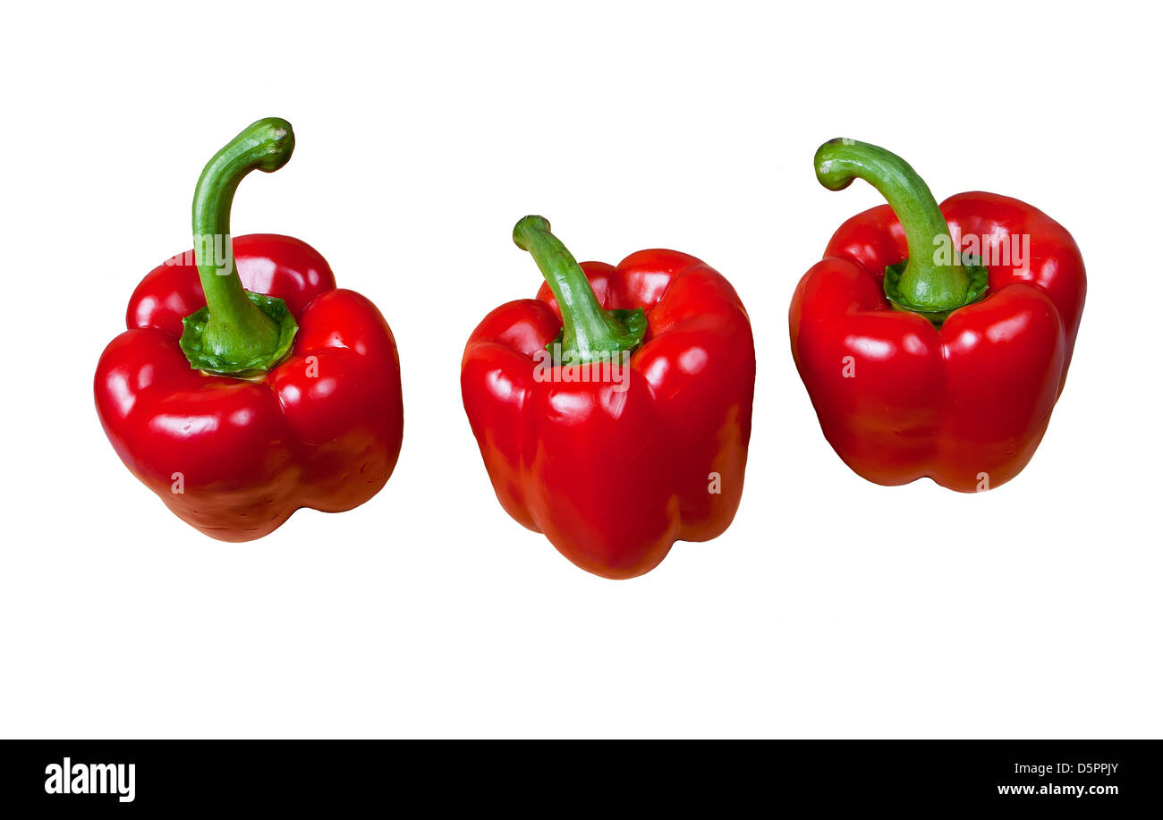 Three pods of red sweet pepper Stock Photo - Alamy