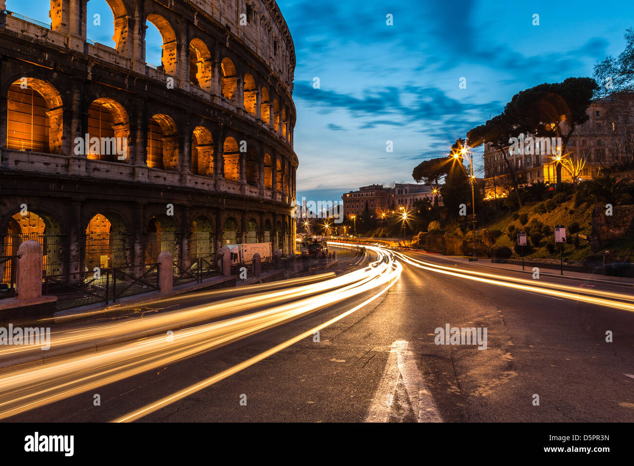 Colosseum in Rome, Italy at night with traffic light streaks Stock ...