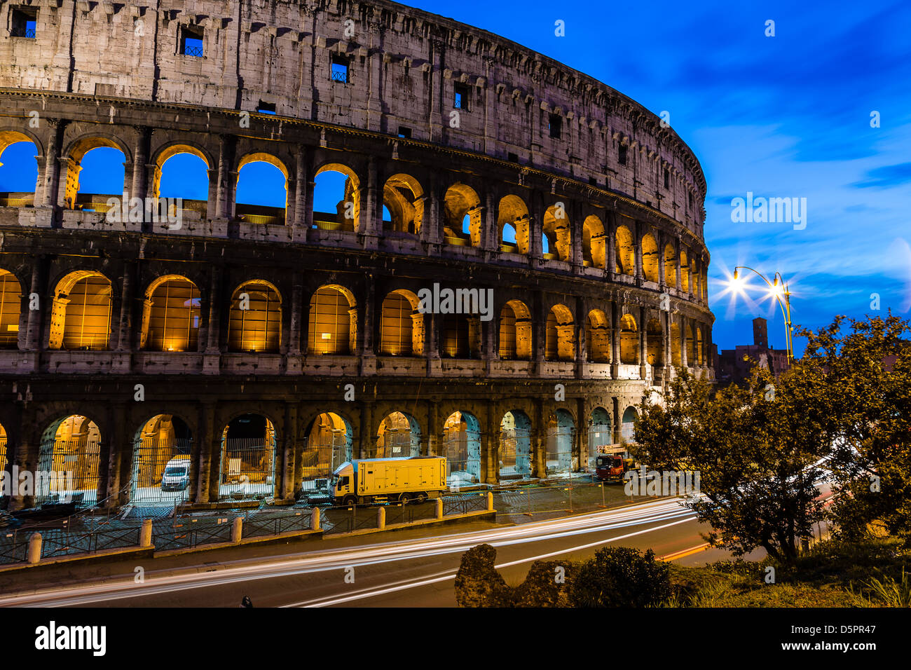 Colosseum in Rome, Italy at night with traffic light streaks Stock ...