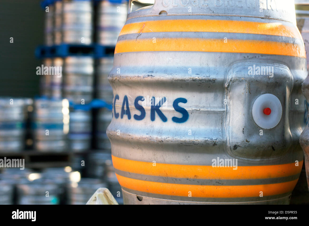 Stacked beer kegs in brewery yard Stock Photo - Alamy
