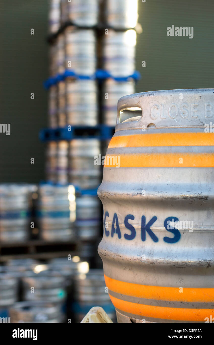 Stacked beer kegs in brewery yard Stock Photo - Alamy