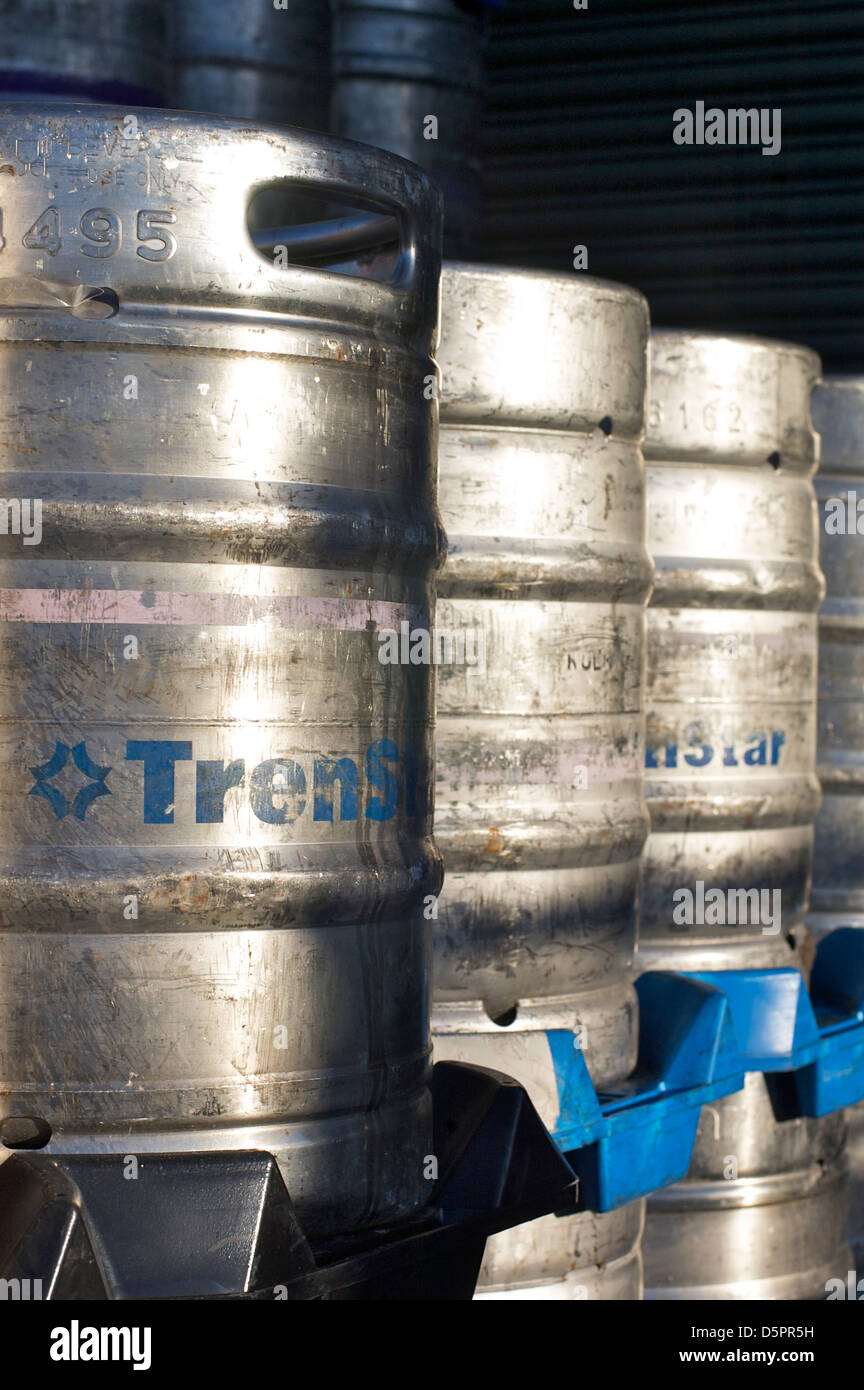 Stacked beer kegs in brewery yard Stock Photo - Alamy