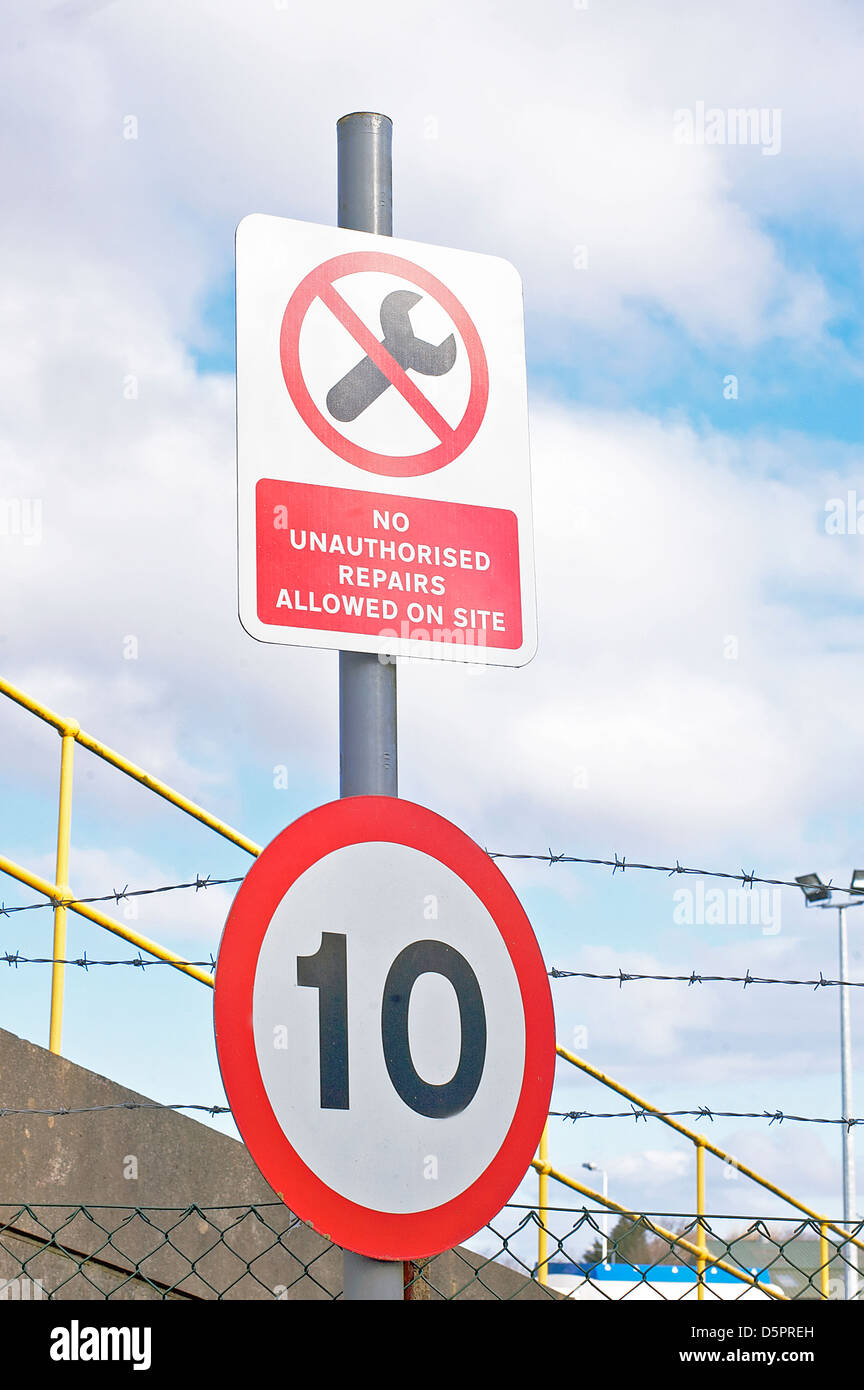 No unauthorised repairs allowed sign Stock Photo - Alamy