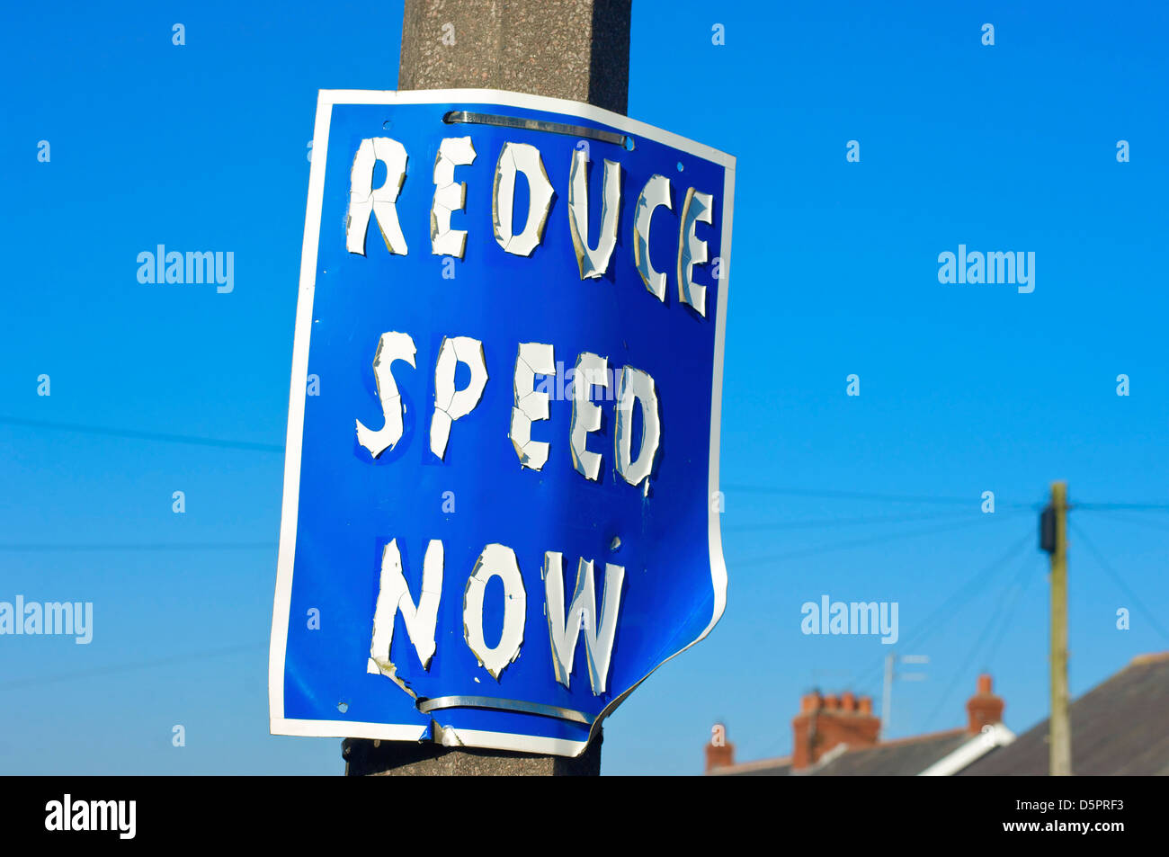 Peeling road traffic sign Stock Photo - Alamy