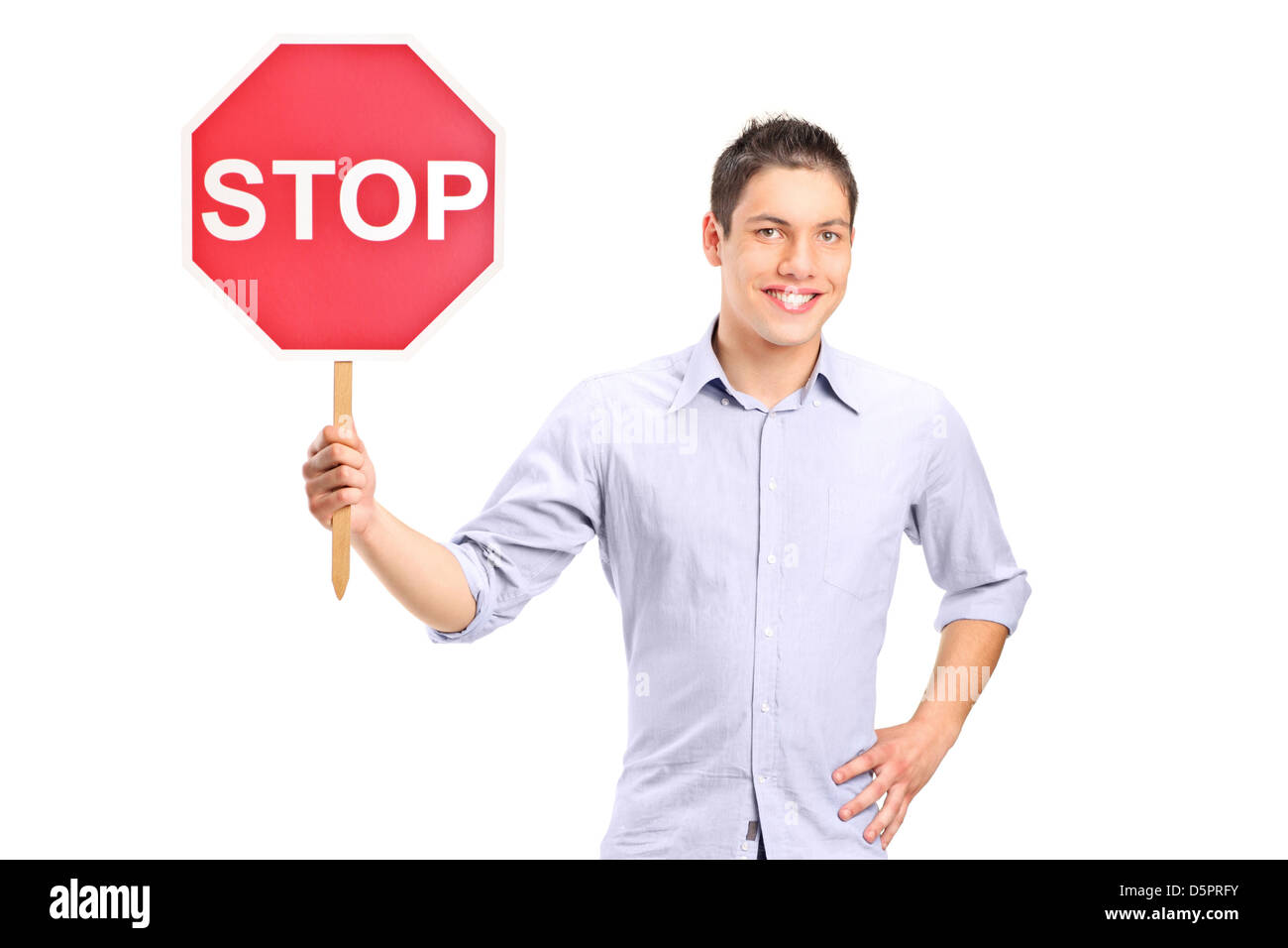 A man holding a traffic sign stop isolated on white background Stock ...