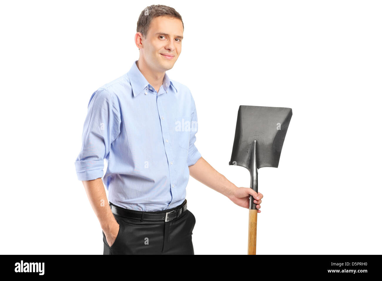 A young man holding a shovel isolated against white background Stock ...