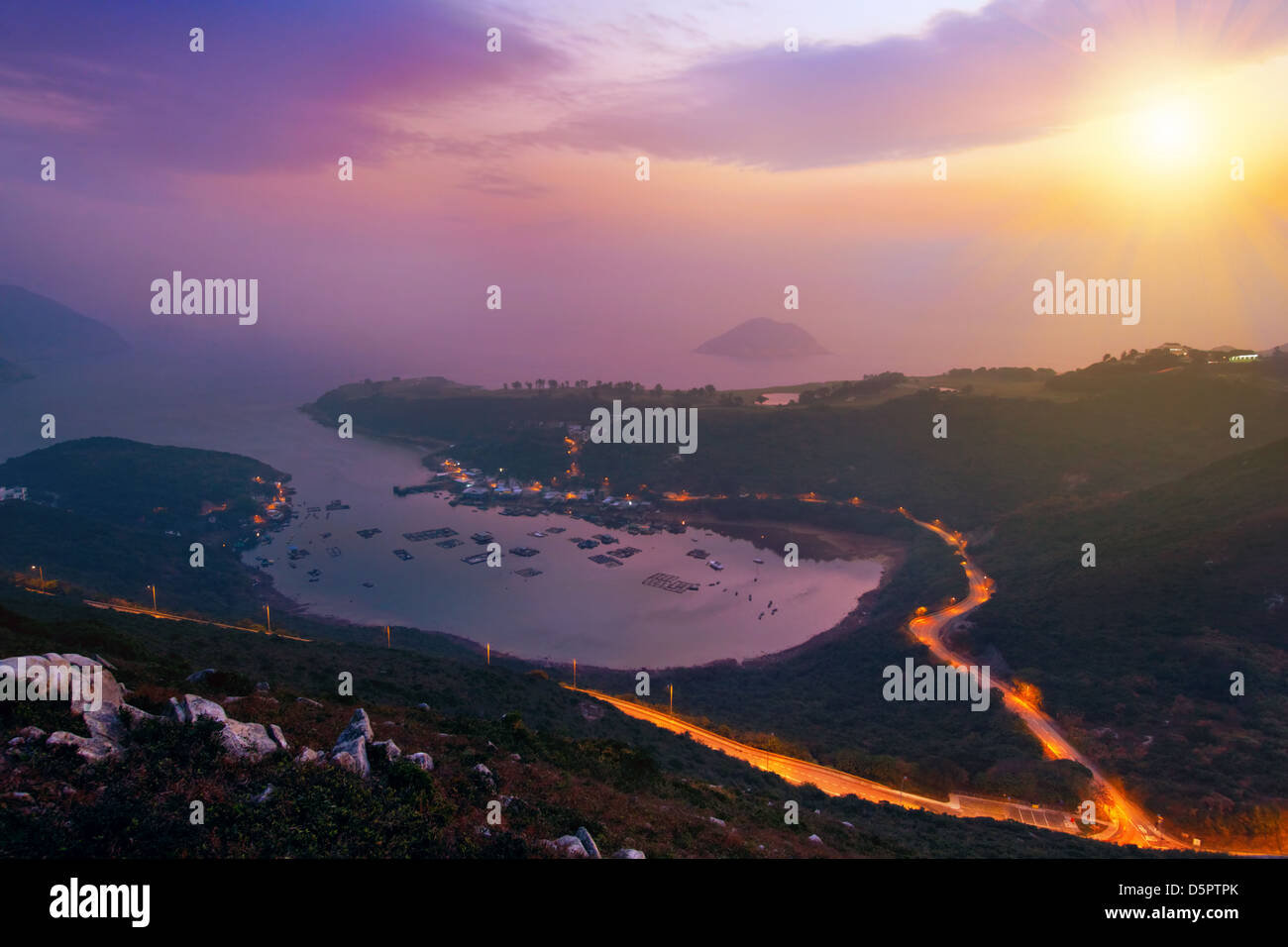 sunrise in sea and mountain Stock Photo - Alamy