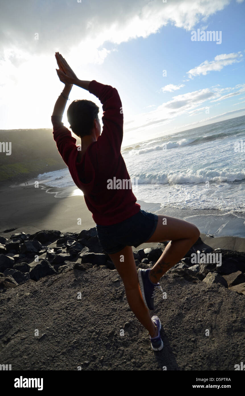 Tree pose yoga woman alone hi-res stock photography and images - Alamy
