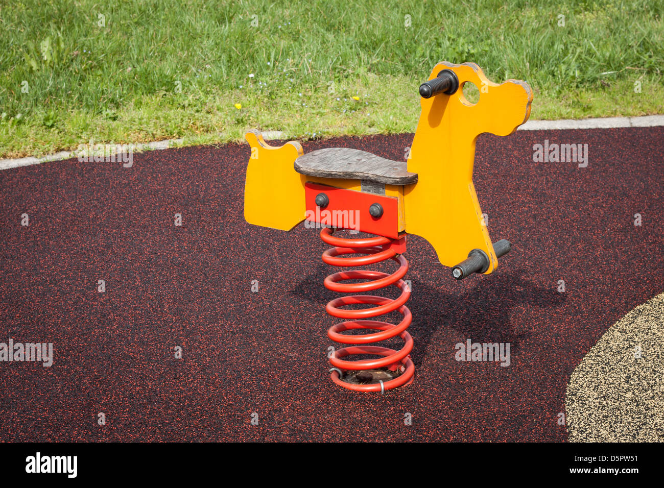 Modern rocking horse in a city park playground Stock Photo - Alamy