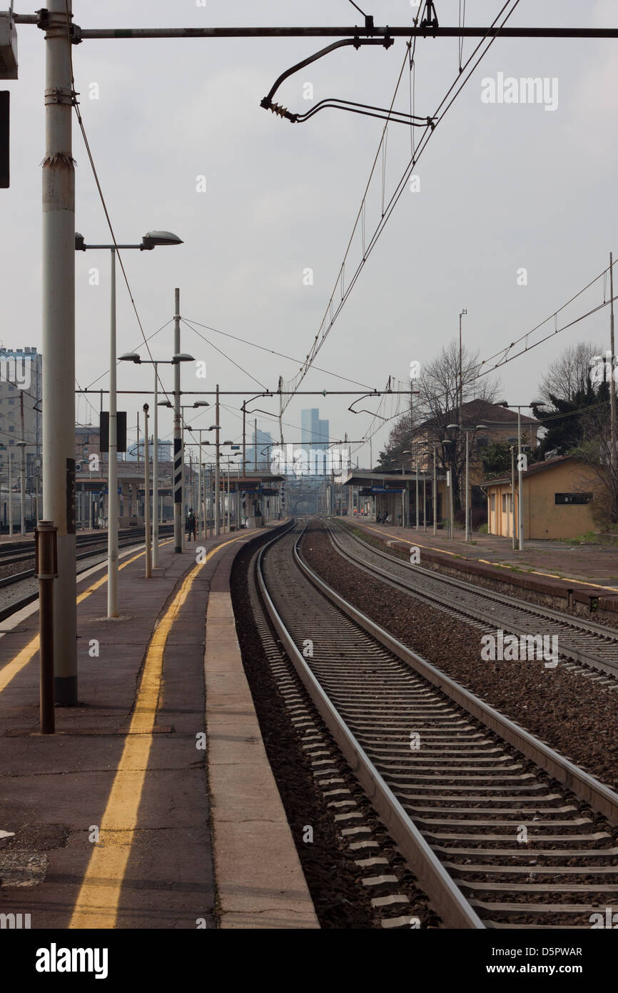 Tracks of a railway station with skyscrapers in the distance Stock ...