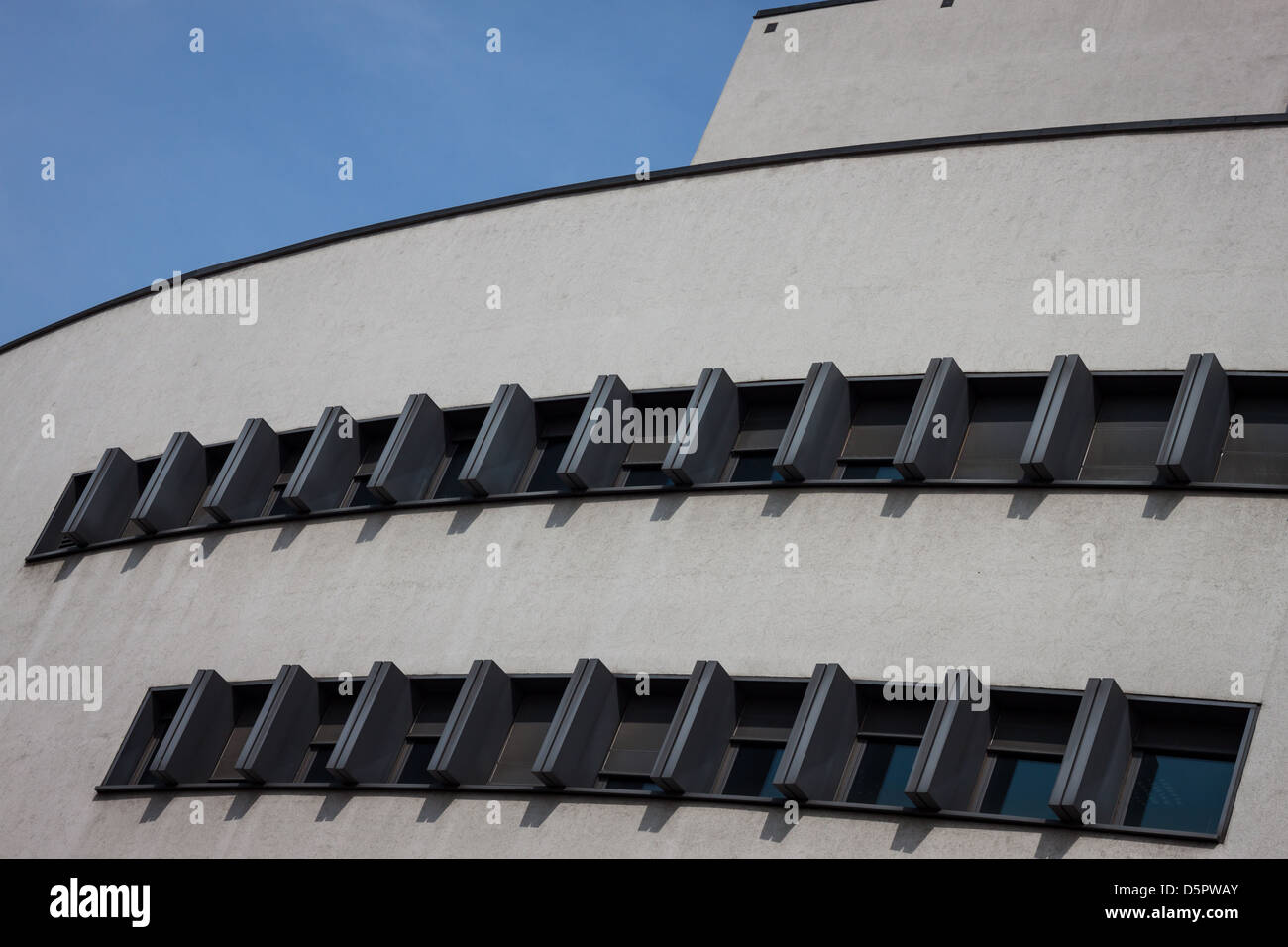 Architectural detail of a modern building with windows Stock Photo - Alamy